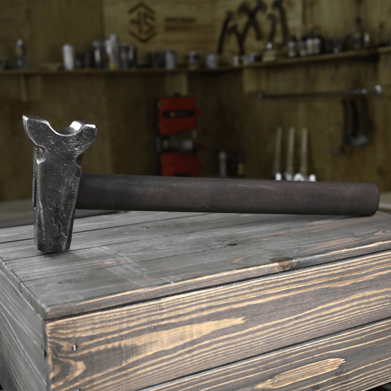 Top swage hammer with different work zones